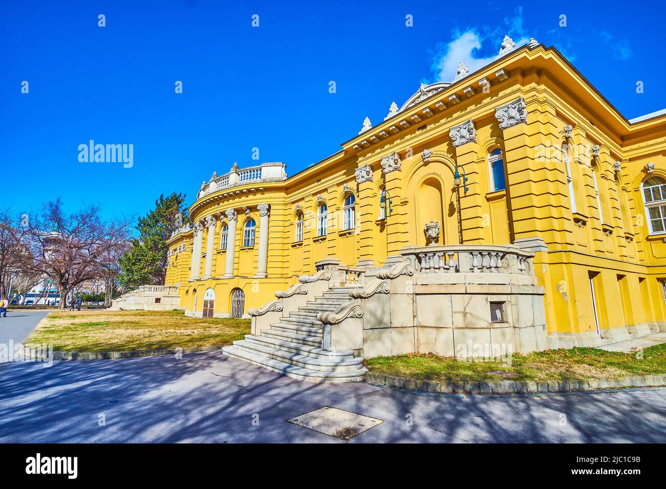 The yellow historical building of Szechenyi Thermal Spa, the most ...