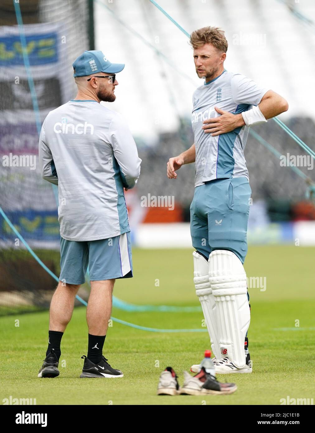 England head coach Brendon McCullum (left) and Joe Root during a nets ...