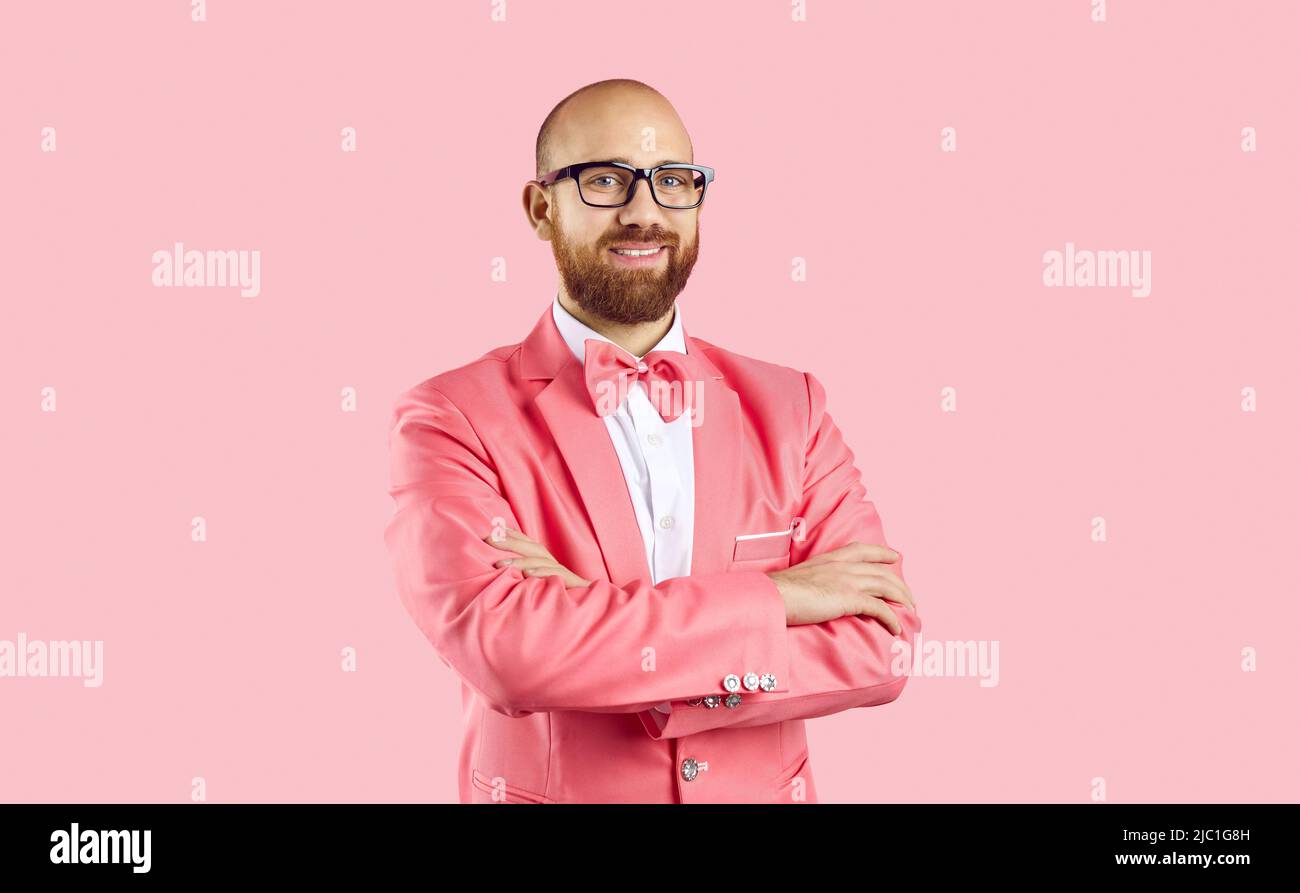 Portrait of happy male performer in pink suit Stock Photo - Alamy