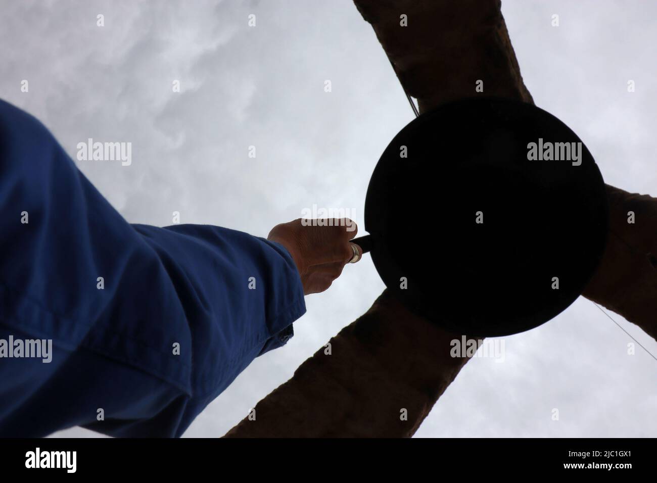 Bell ringing woman church hi-res stock photography and images - Alamy