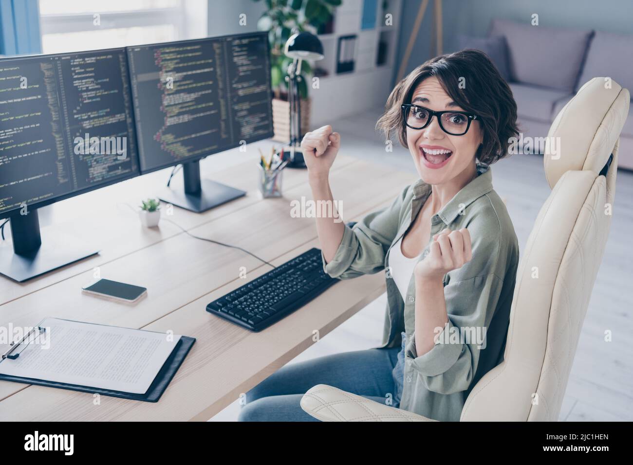 Photo of cheerful crazy female screaming hooray raise fists in triumph ...