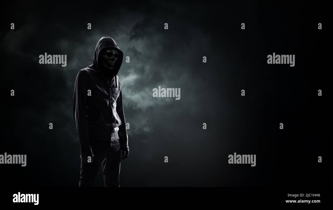 Scary and creepy male monster with gouged eyes looking like a skull ...