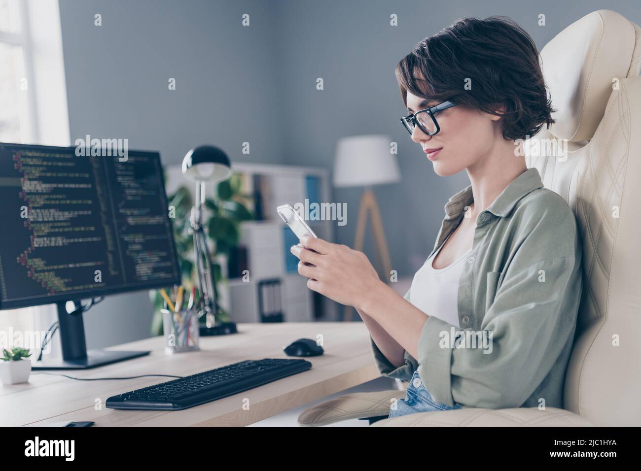 Profile side photo of it office worker have break relaxing sit leather ...