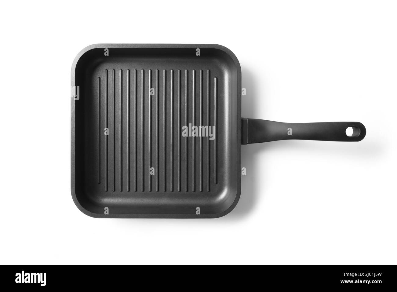 Empty cast iron grill pan with handle isolated on white background ...