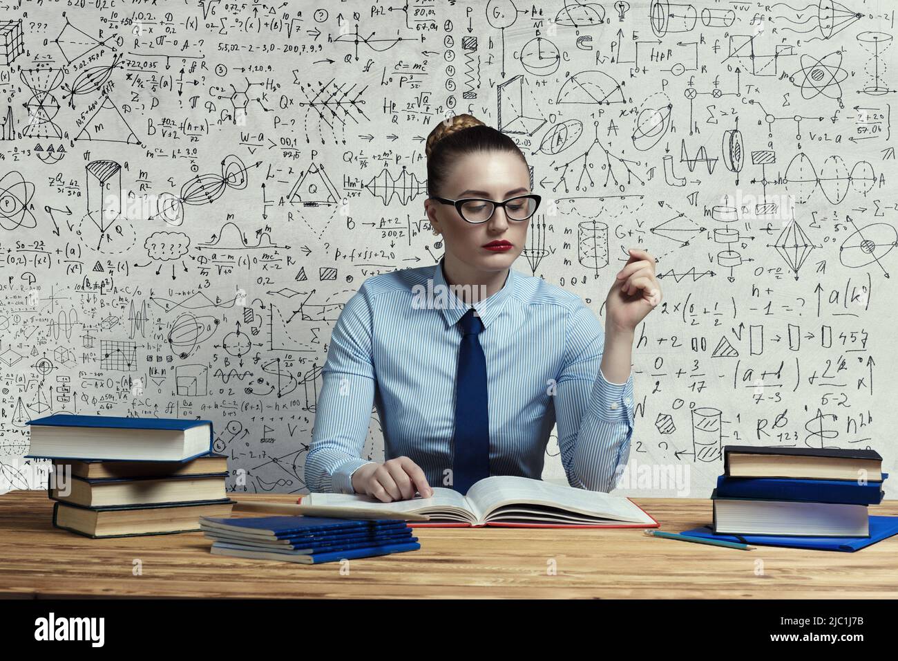 Strict female teacher . Mixed media Stock Photo - Alamy