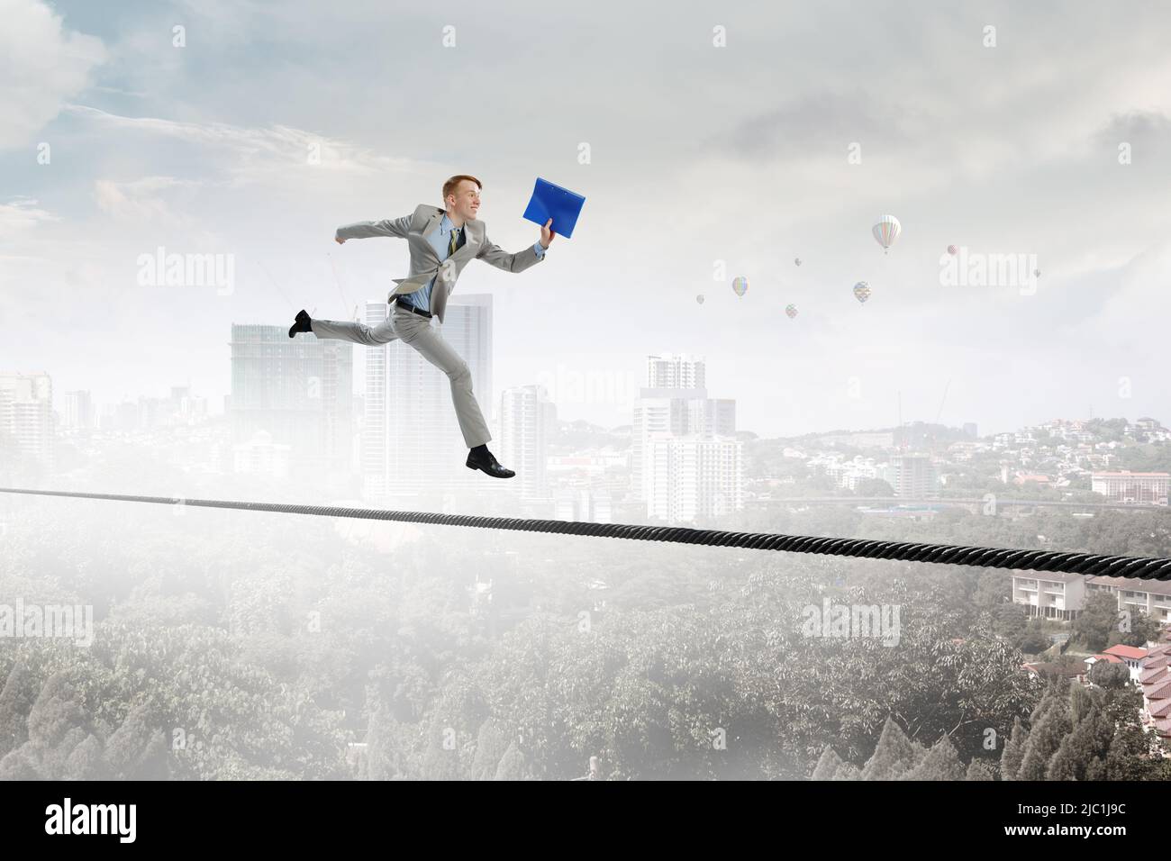 Portrait energetic businessman jumping hi-res stock photography and ...