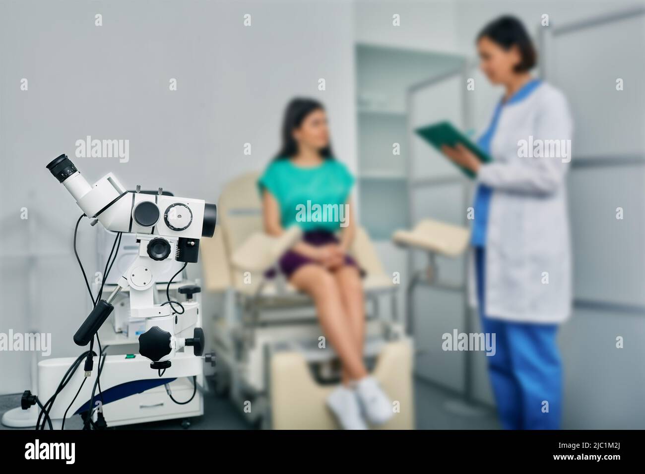 Women's health, colposcopy, gynecology. Woman patient sitting in ...