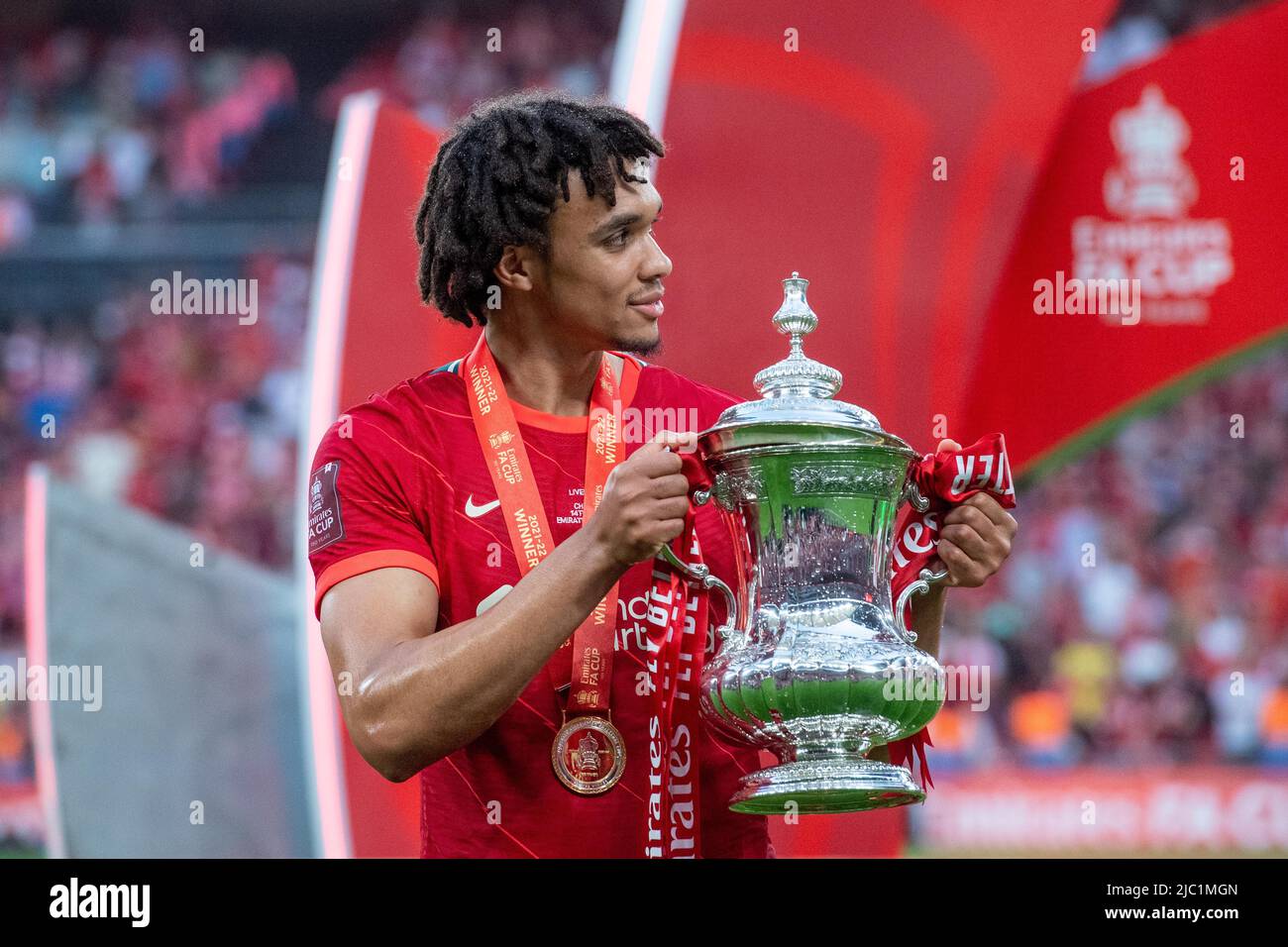 LONDON, ENGLAND - MAY 14: Trent Alexander-Arnold of Liverpool lifts the ...