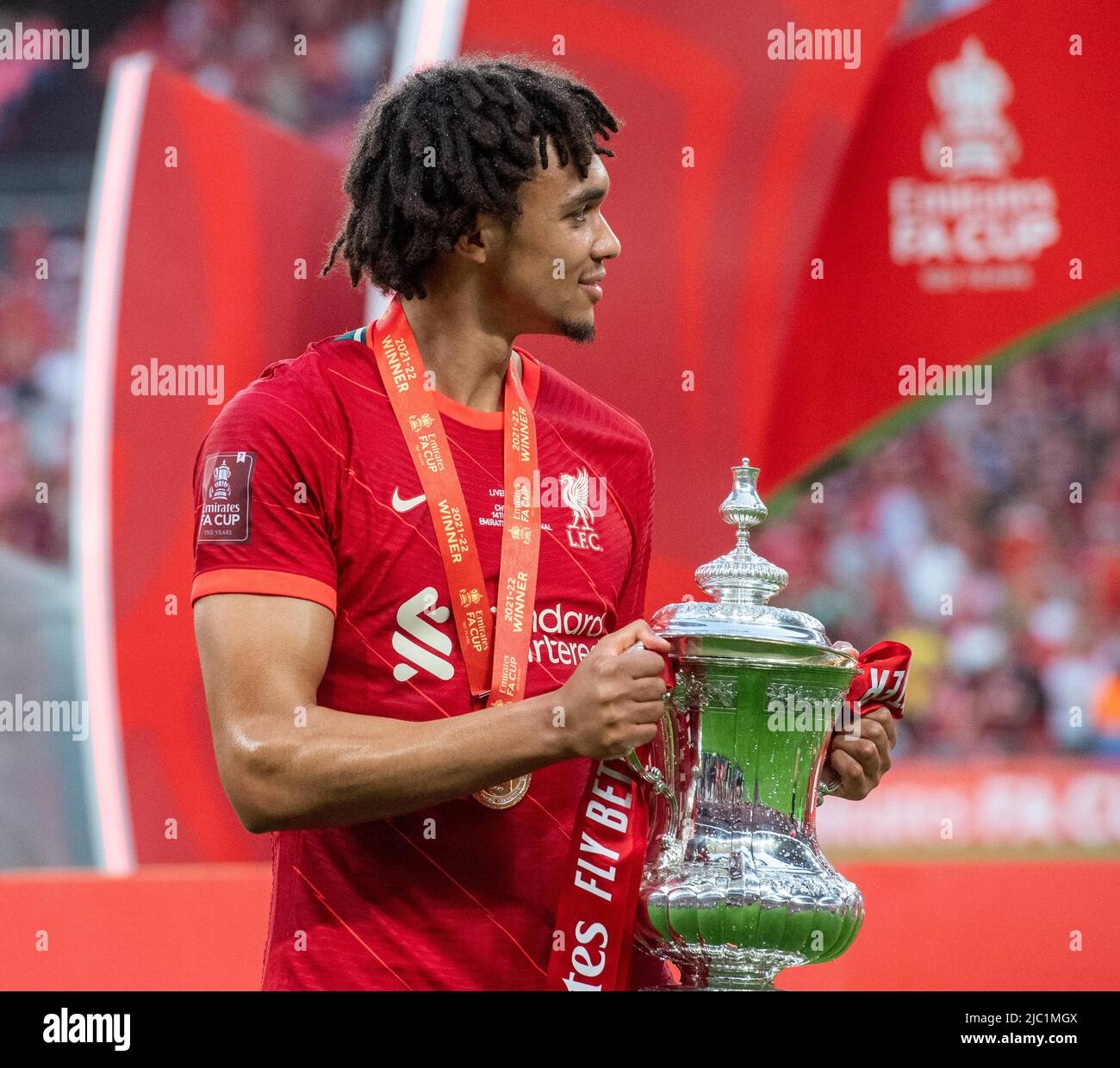 LONDON, ENGLAND - MAY 14: Trent Alexander-Arnold of Liverpool lifts the ...