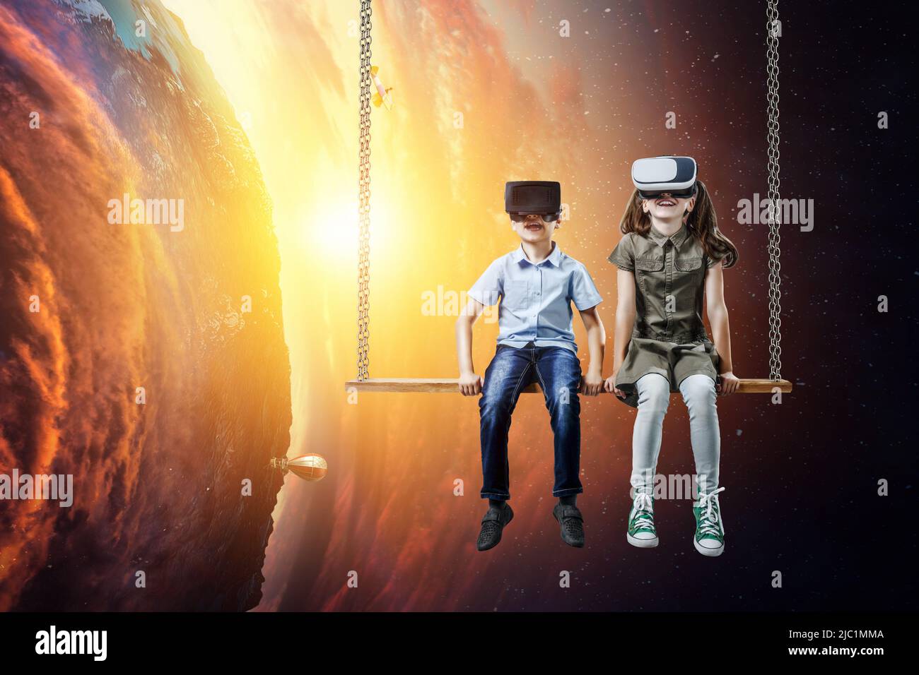 Kids wearing virtual reality goggles Stock Photo - Alamy