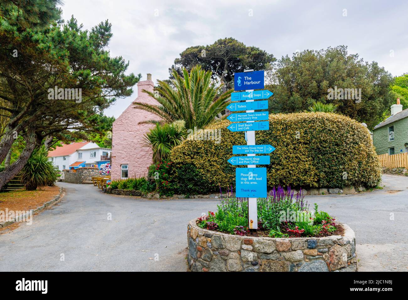 Blue finger post signpost in the Harbour with directions to the ...
