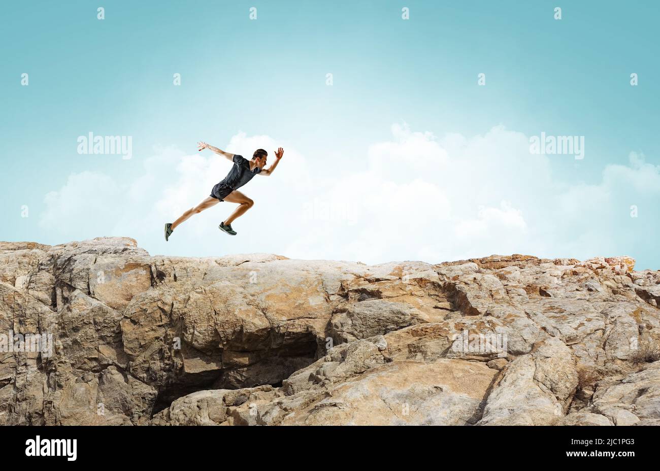 Man in sportwear running . Mixed media Stock Photo - Alamy