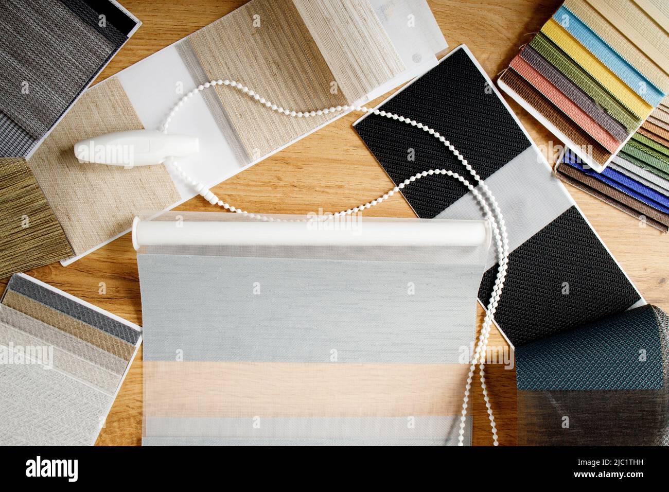 Samples of fabrics of different textures and colors in the form of a ...