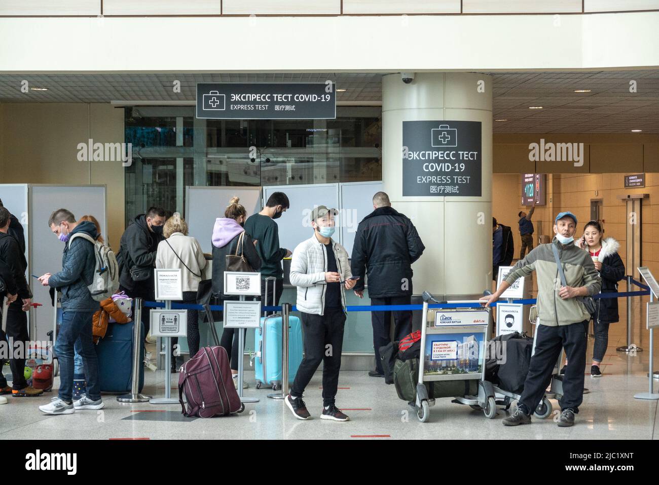 Queue to rapid COVID 19 test booth Stock Photo - Alamy