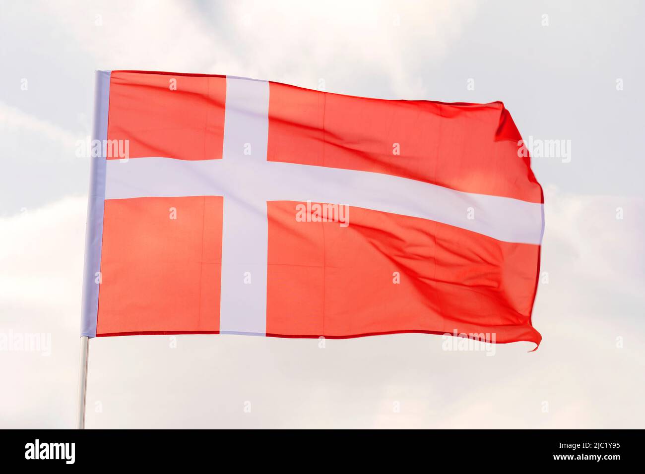 close up waving flag of Denmark. flag symbols of Denmark. cloudy Stock ...