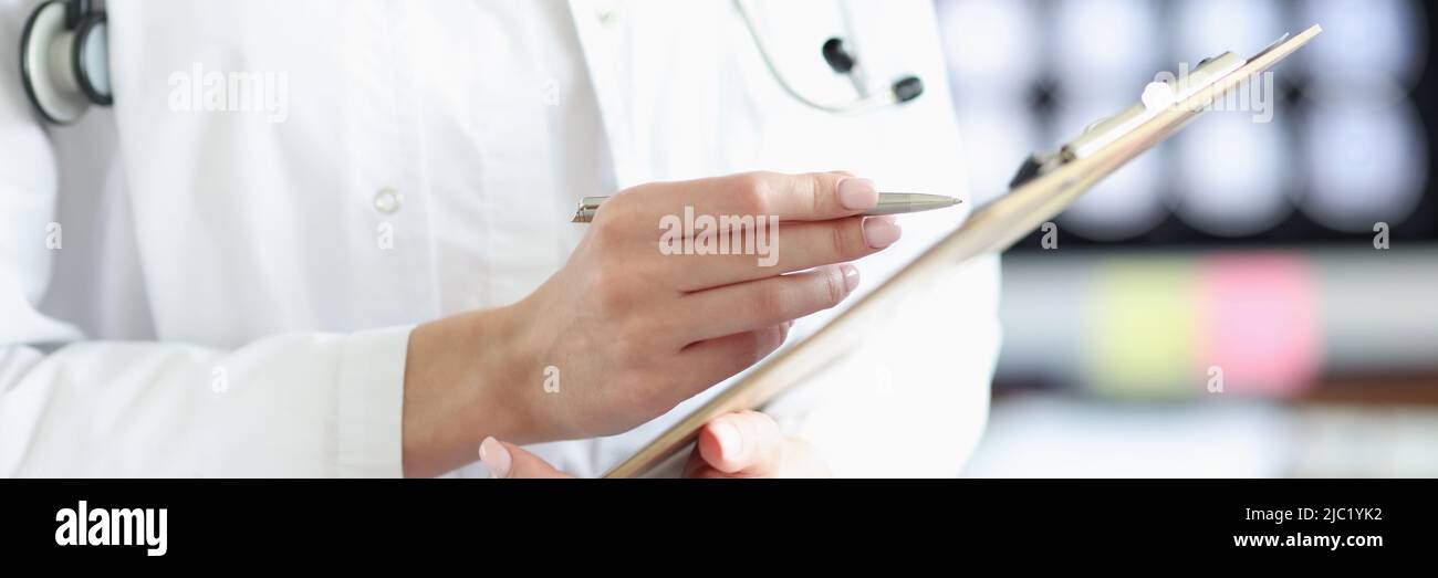 Doctor in medical gown hold clipboard with prescription paper Stock ...
