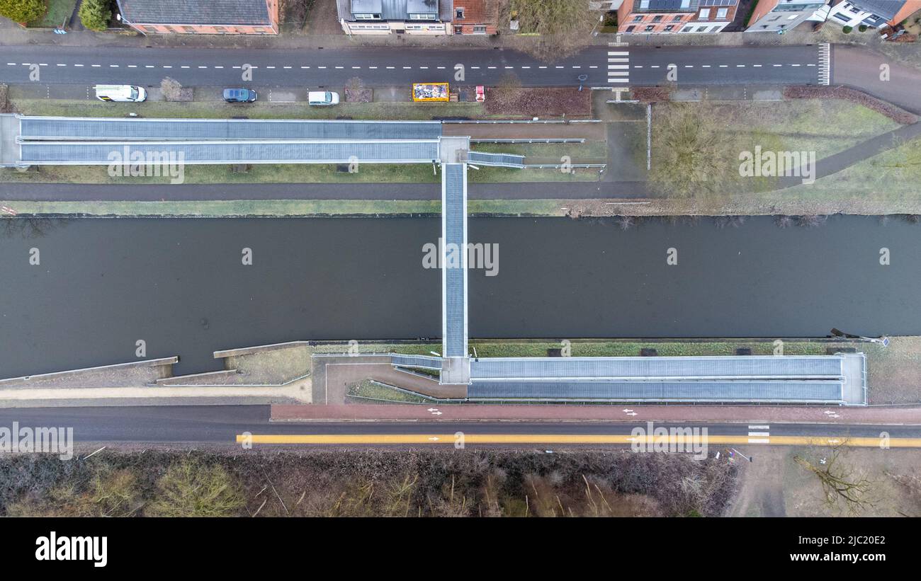 Aerial view of a walking or pedestrian bridge over a canal or river ...
