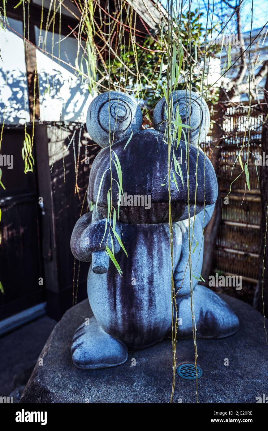 Sculpture of Frogs fighting near the entrance to Nawate dori in ...