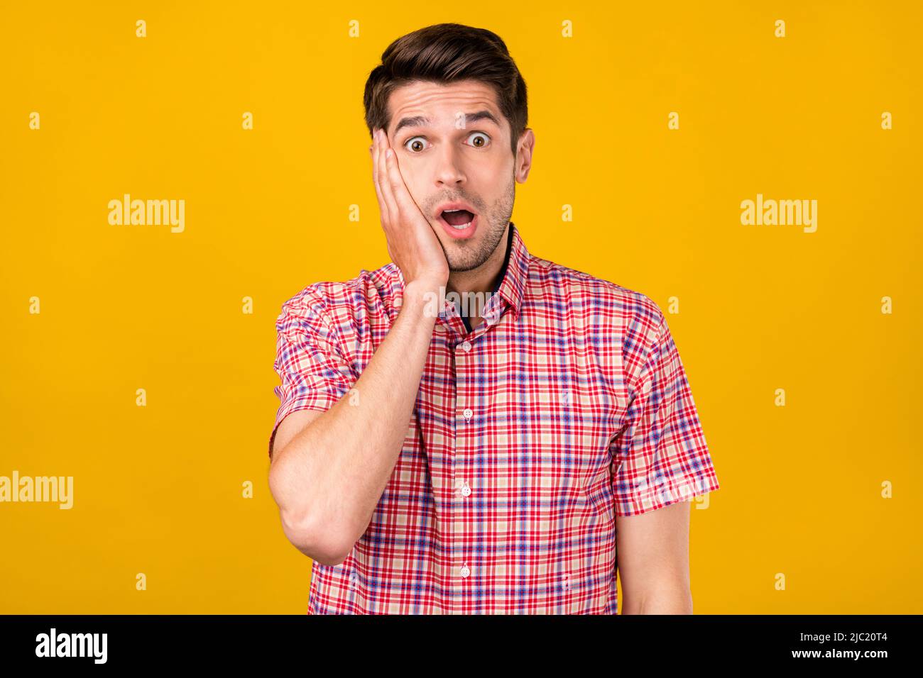 Portrait of attractive amazed puzzled guy facepalm oops staring eyes ...