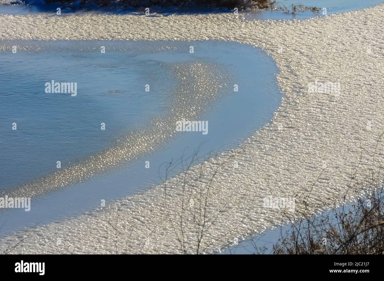 Frozen water, patterns of snow in small lakes. Tiligul estuary, Ukraine ...