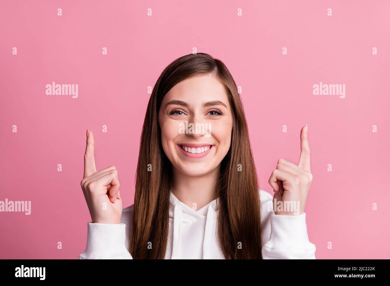 Photo of young girl happy positive smile point fingers empty space ...