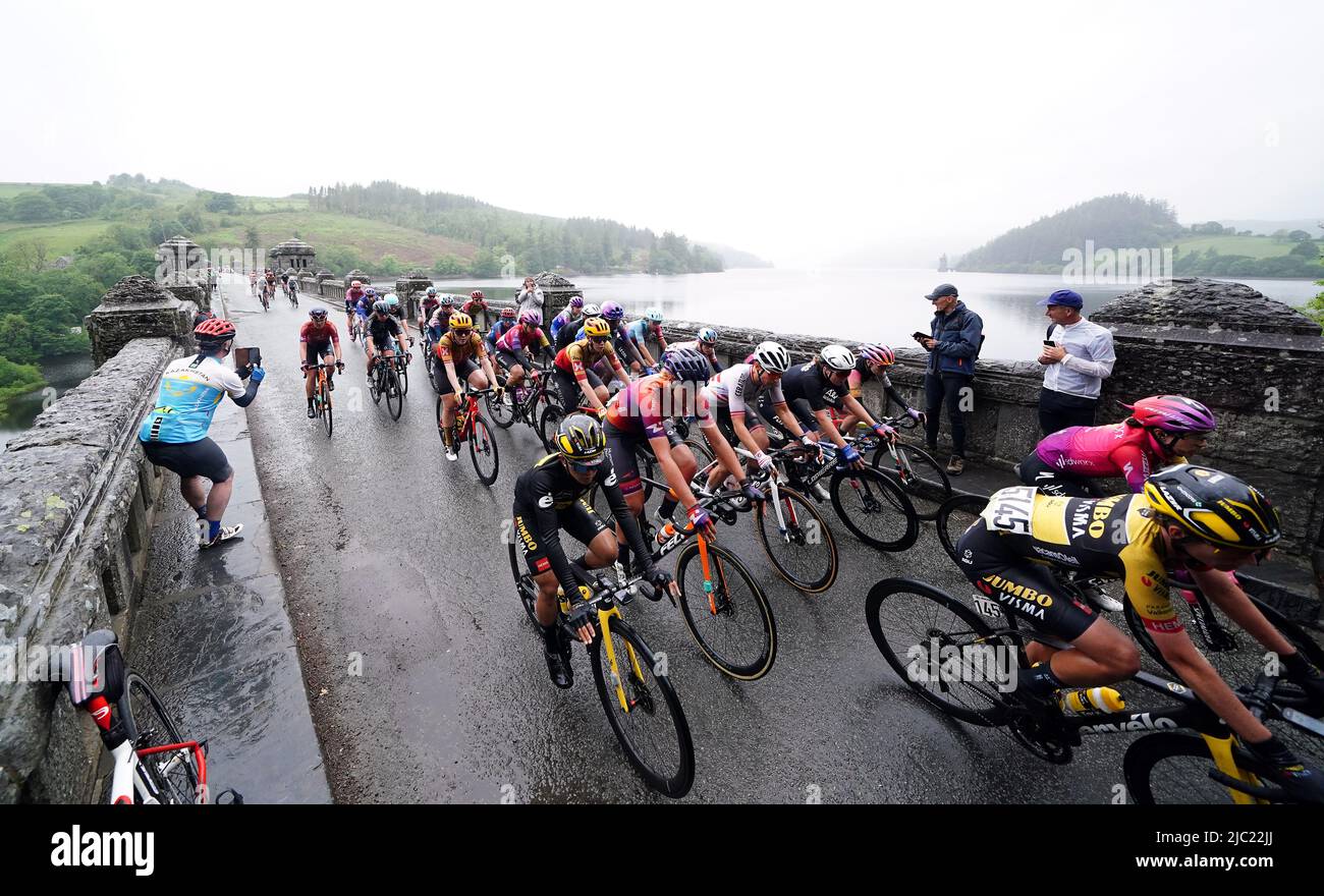 The peloton passes Lake Vyrnwy during stage four of The Women's Tour ...