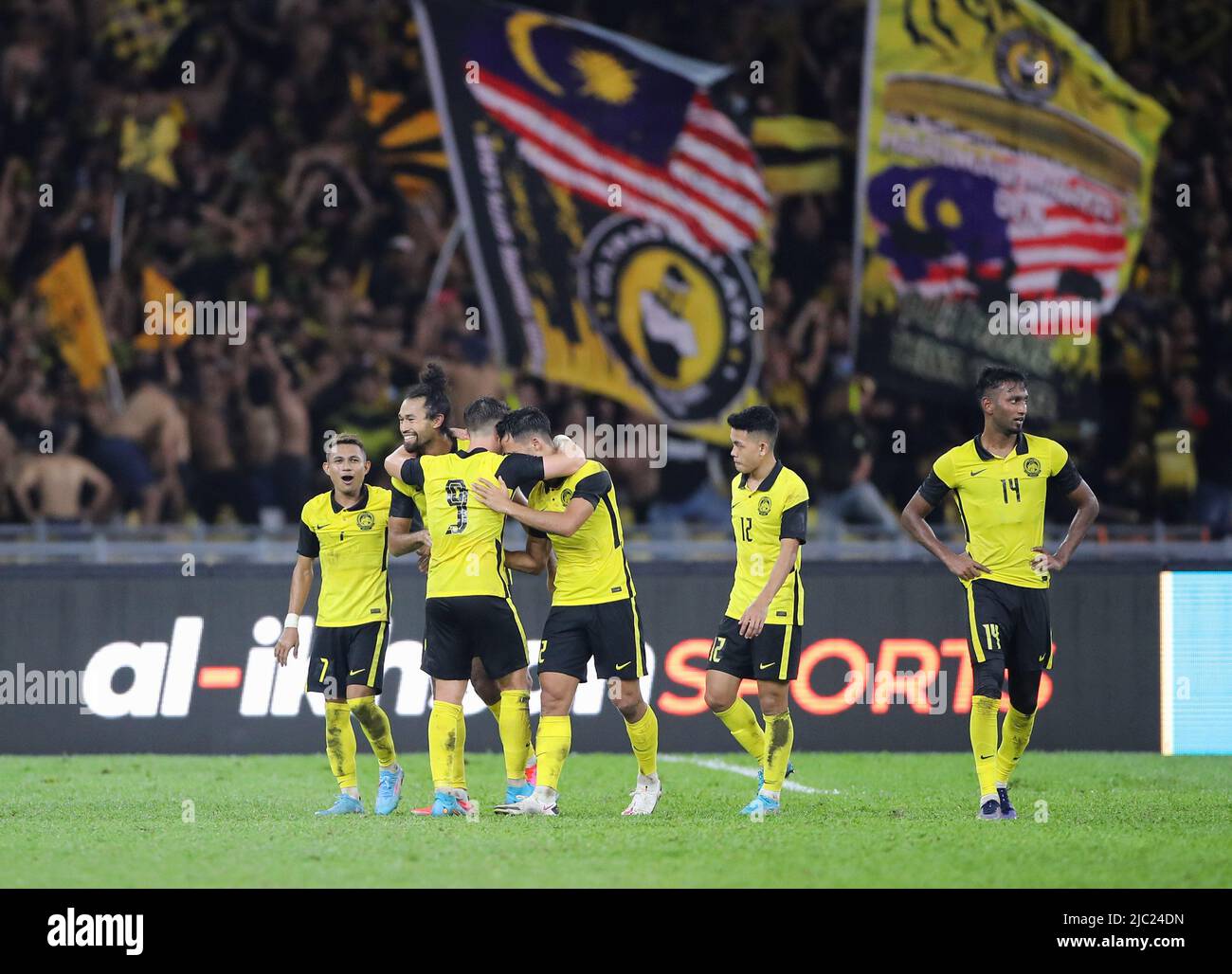 Malaysia team players celebrate after scoring a goal during the AFC ...