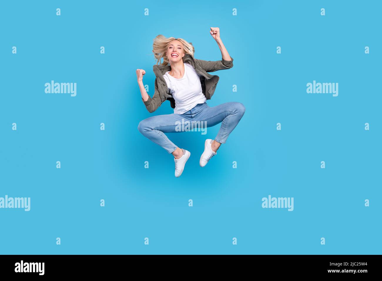 Full length body size photo woman jumping up gesturing like winner ...