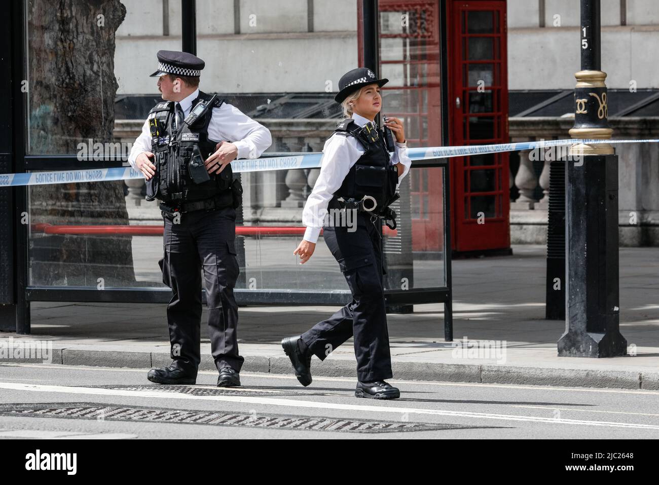 Metropolitan Police officers cordoning off Whitehall in Westminster ...