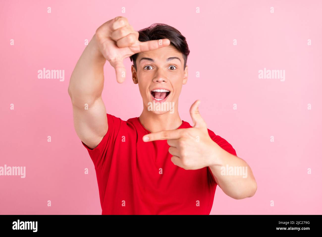 Photo of young guy happy positive smile show fingers frame border sign ...