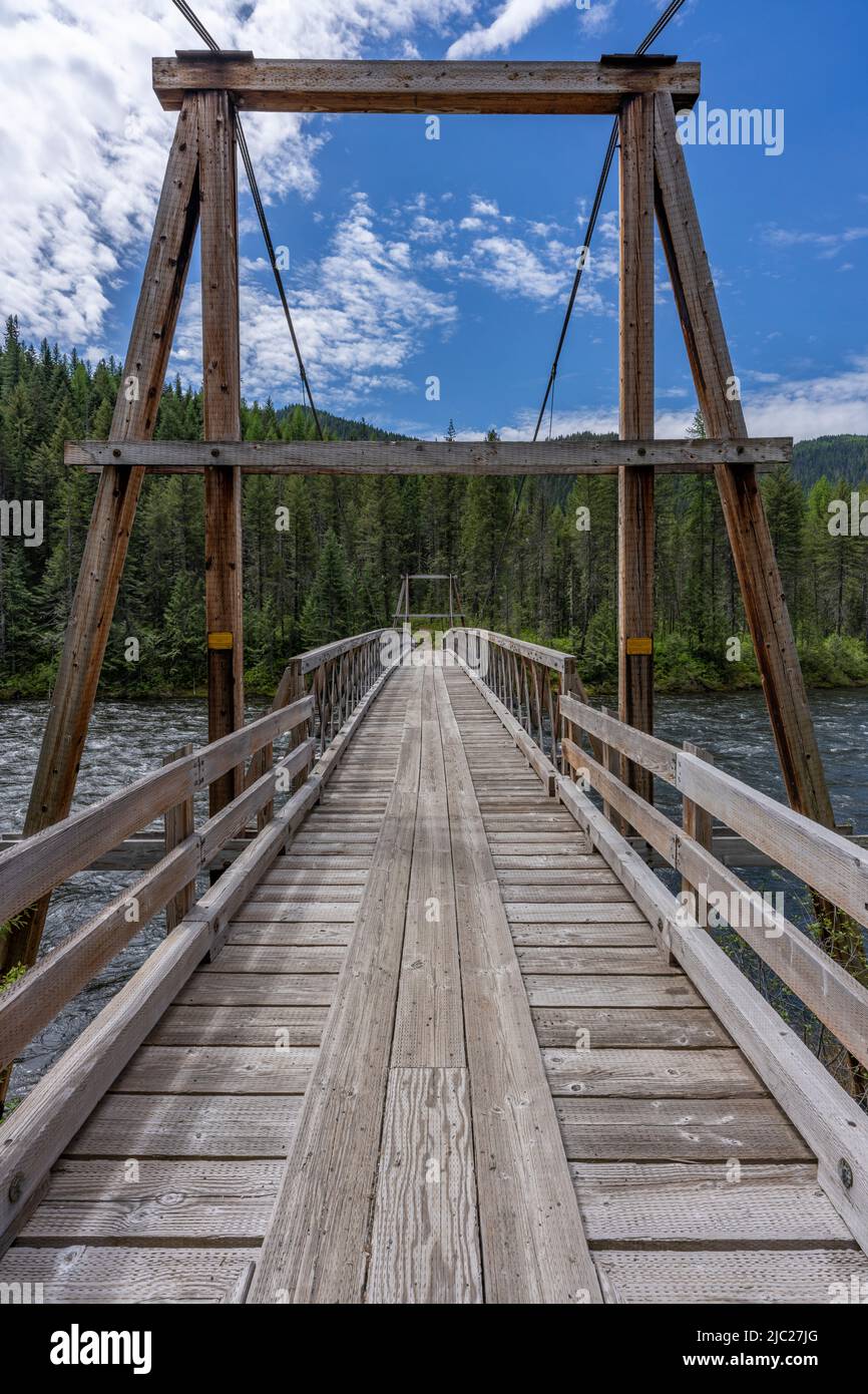 A foot bridge over the Lochsa River at the Split Creek Trailhead in the ...