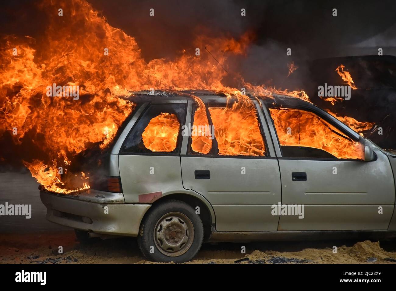 Flaming car hi-res stock photography and images - Alamy