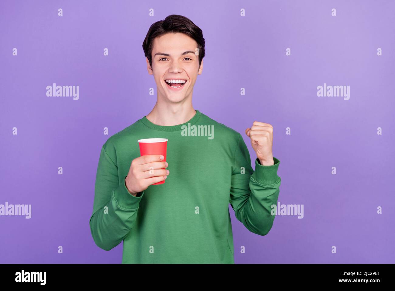 Photo of young guy happy positive smile drink beer champion rejoice ...