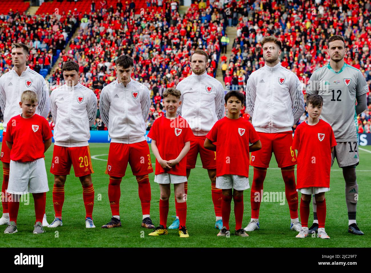 CARDIFF, WALES - 08 JUNE 2022: Wales' Chris Mepham,m Wales' Dan James ...