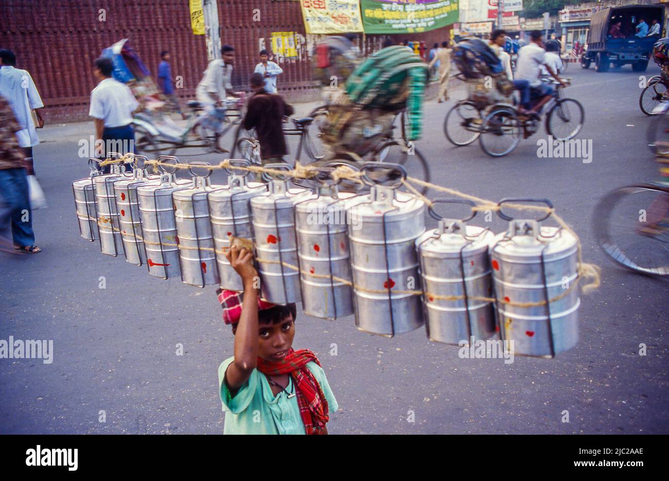 Bangladesh; child carrying dabba wallah, home cooked meals Stock Photo ...