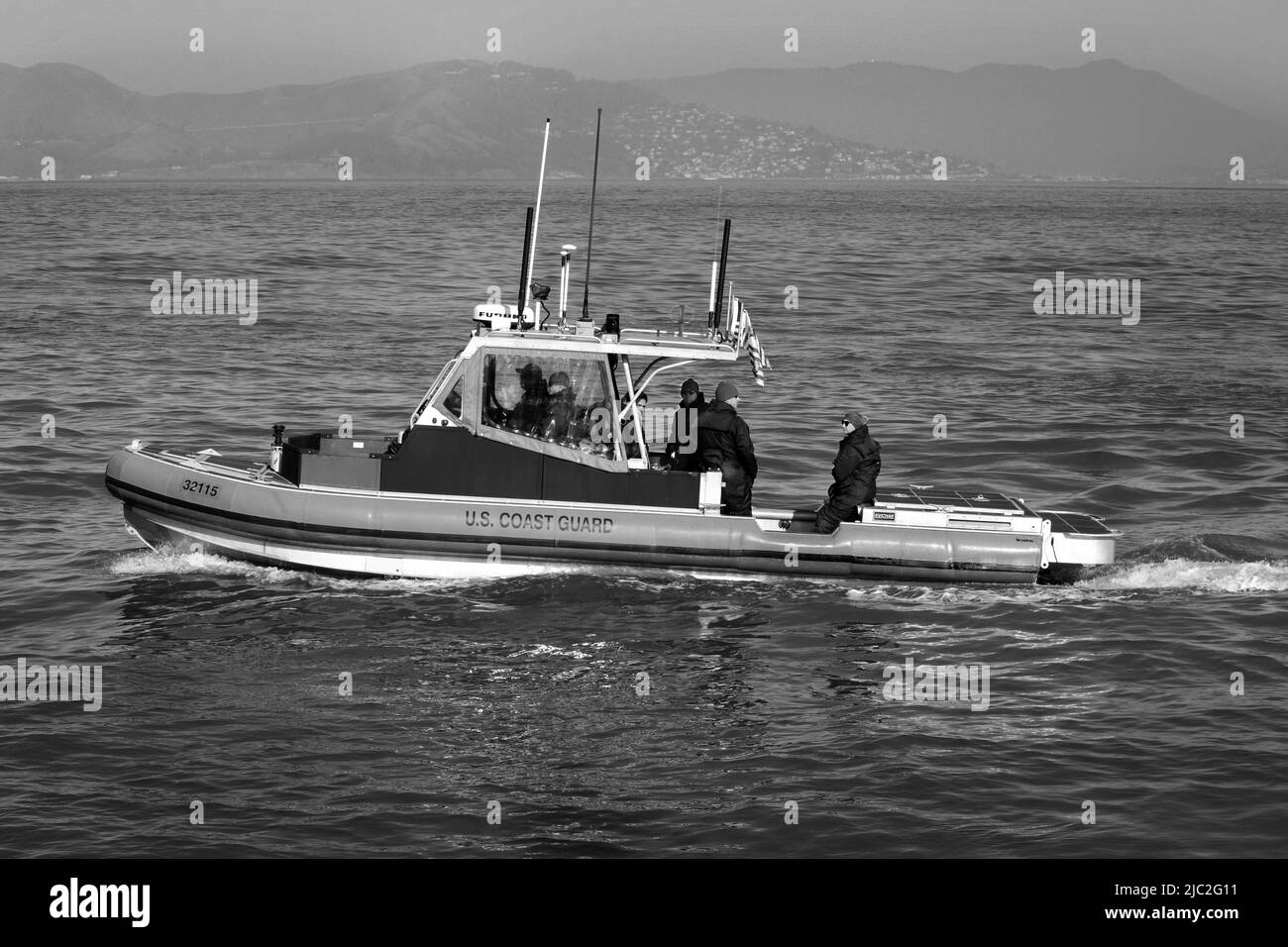 Members of the U.S. Coast Guard partol California's San Francisco Bay ...