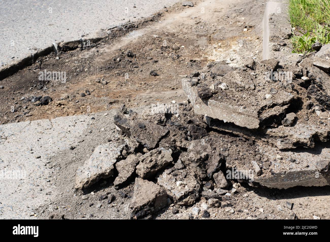 Destroyed road and fragments of asphalt close up, road repairs Stock ...