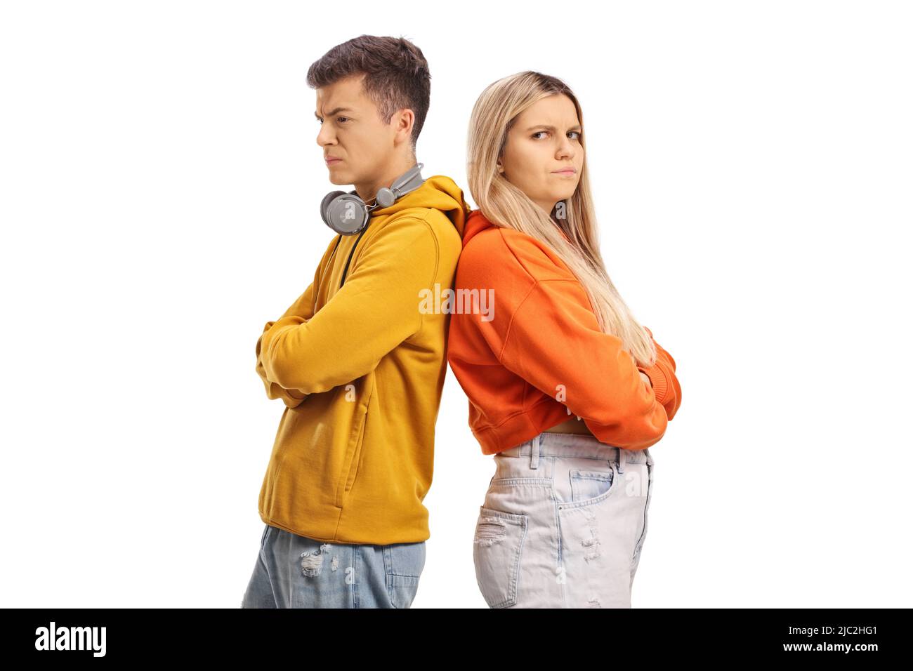 Young angry male and female standing back to back isolated on white ...