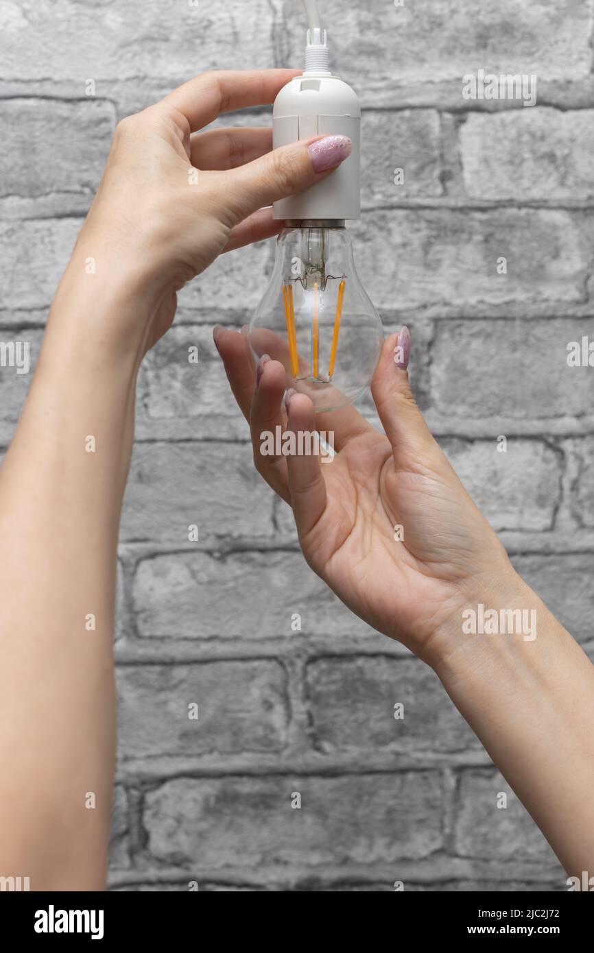 Screwing the socket hi-res stock photography and images - Alamy