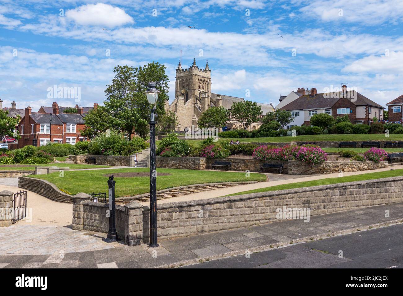 A scenic Croft Gardens area with St.Hildas Church at the Headland,Old ...
