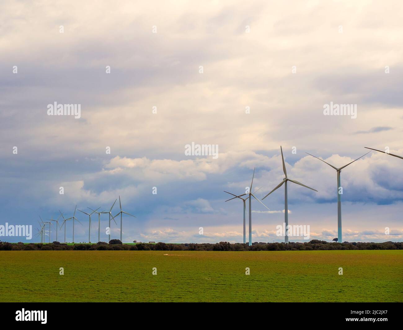 Group of wind turbines for electric energy production Stock Photo - Alamy