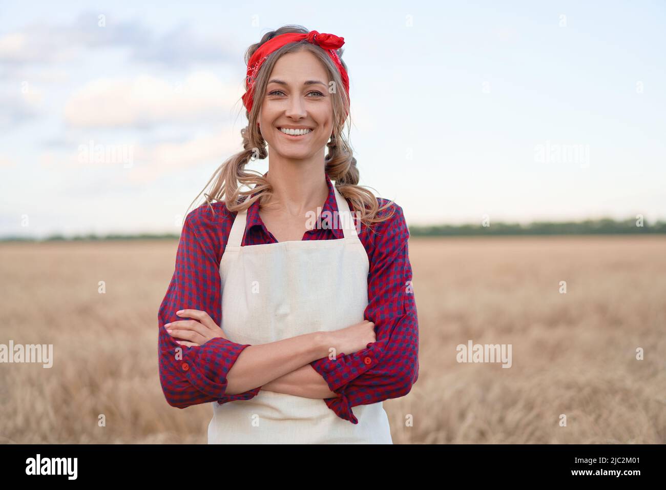 Woman farmer standing farmland smiling Female agronomist specialist ...