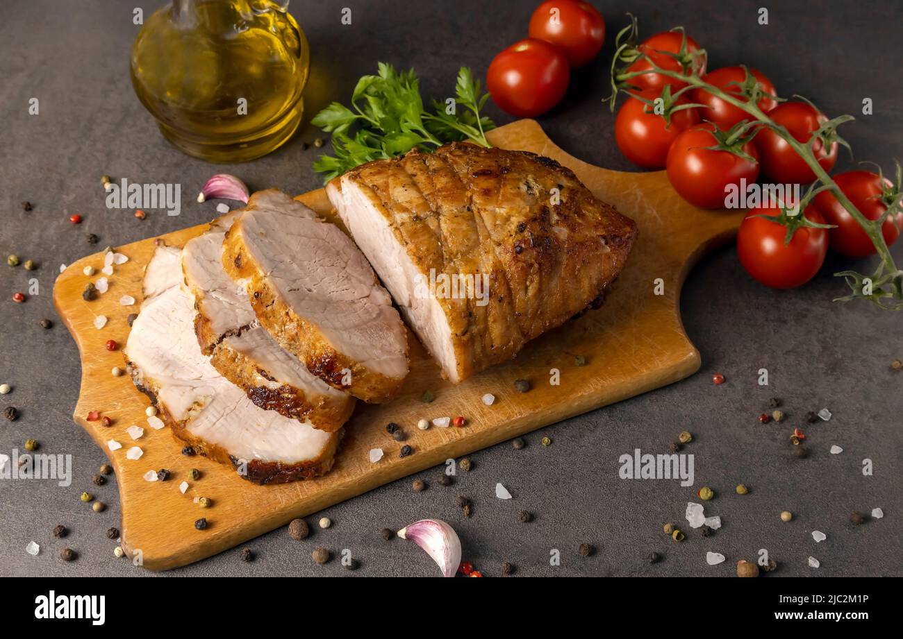 Baked meat with a crispy appetizing crust Stock Photo - Alamy
