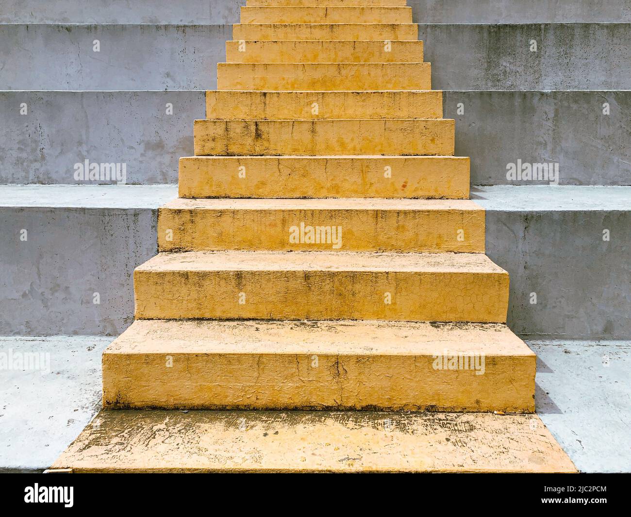 Concrete staircase. Yellow colored minimalist stairs in perspective ...