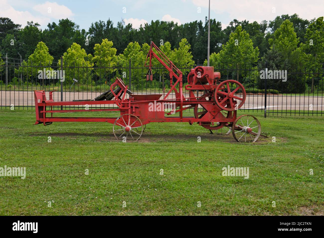 Antique hay baler Stock Photo - Alamy