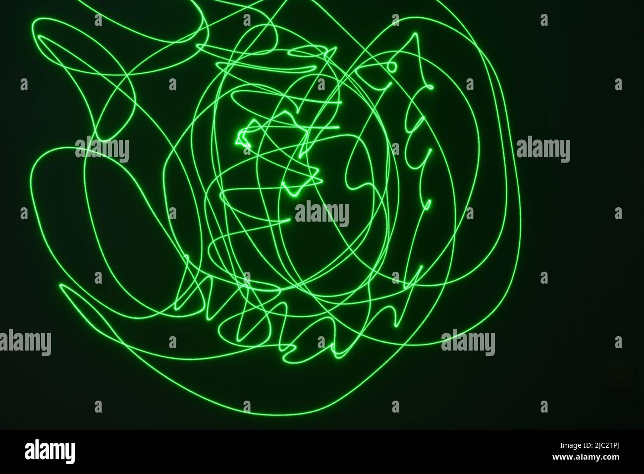 Long exposure image of laser beam on wall Stock Photo - Alamy