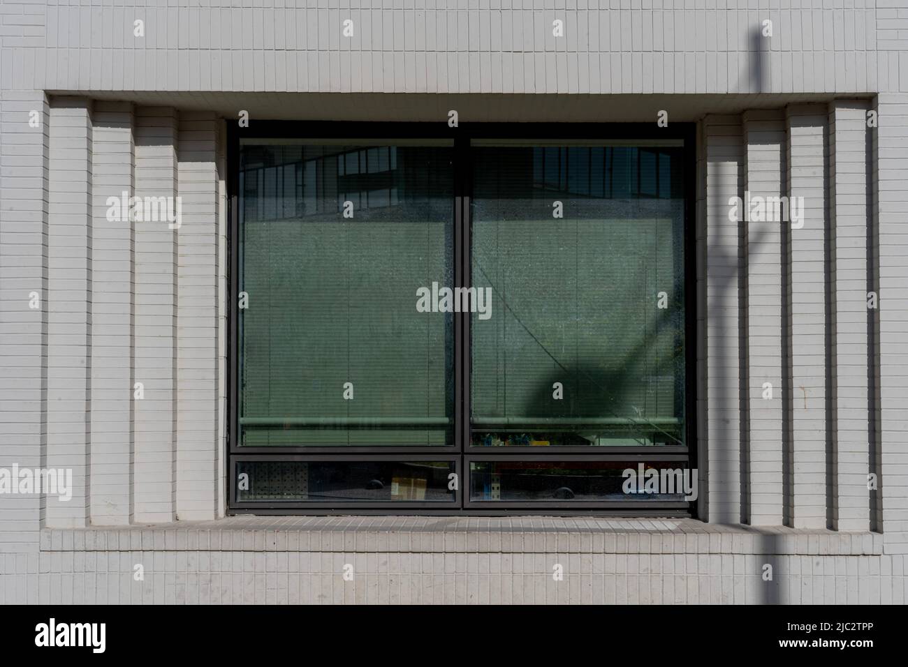 Eco-neighborhood. View of an office window in a modern building Stock ...