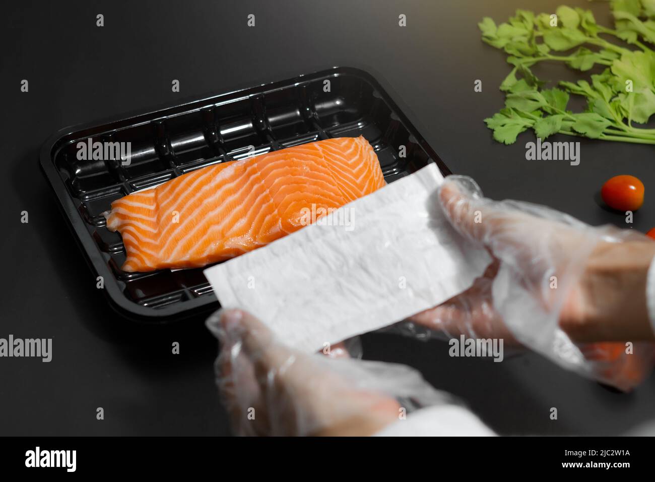 Salmon run stock on plastic packaging with food absorbent in ...
