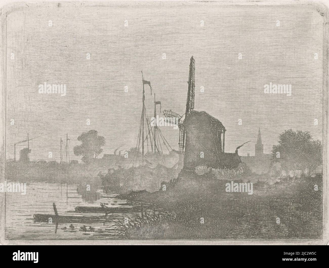 A mill by the water, in the distance is a town., View of a mill by the ...