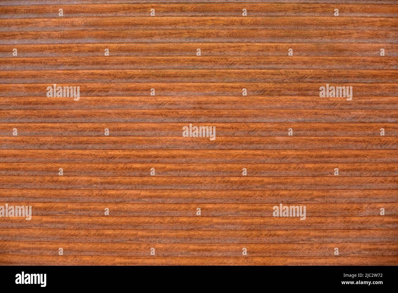 Background of brown horizontal metal strips. Roller blinds and garage ...